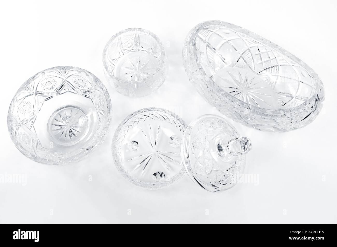 Transparent crystal ware of the various design and shapes on light ...