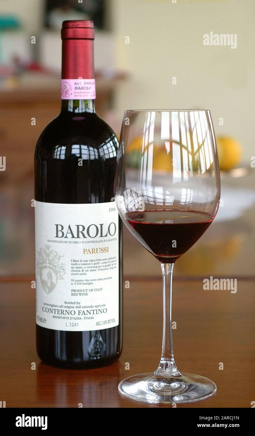 Turin, Piedmont/Italy. -10/24/2009- The Wineshow. Bottle of aged red ...
