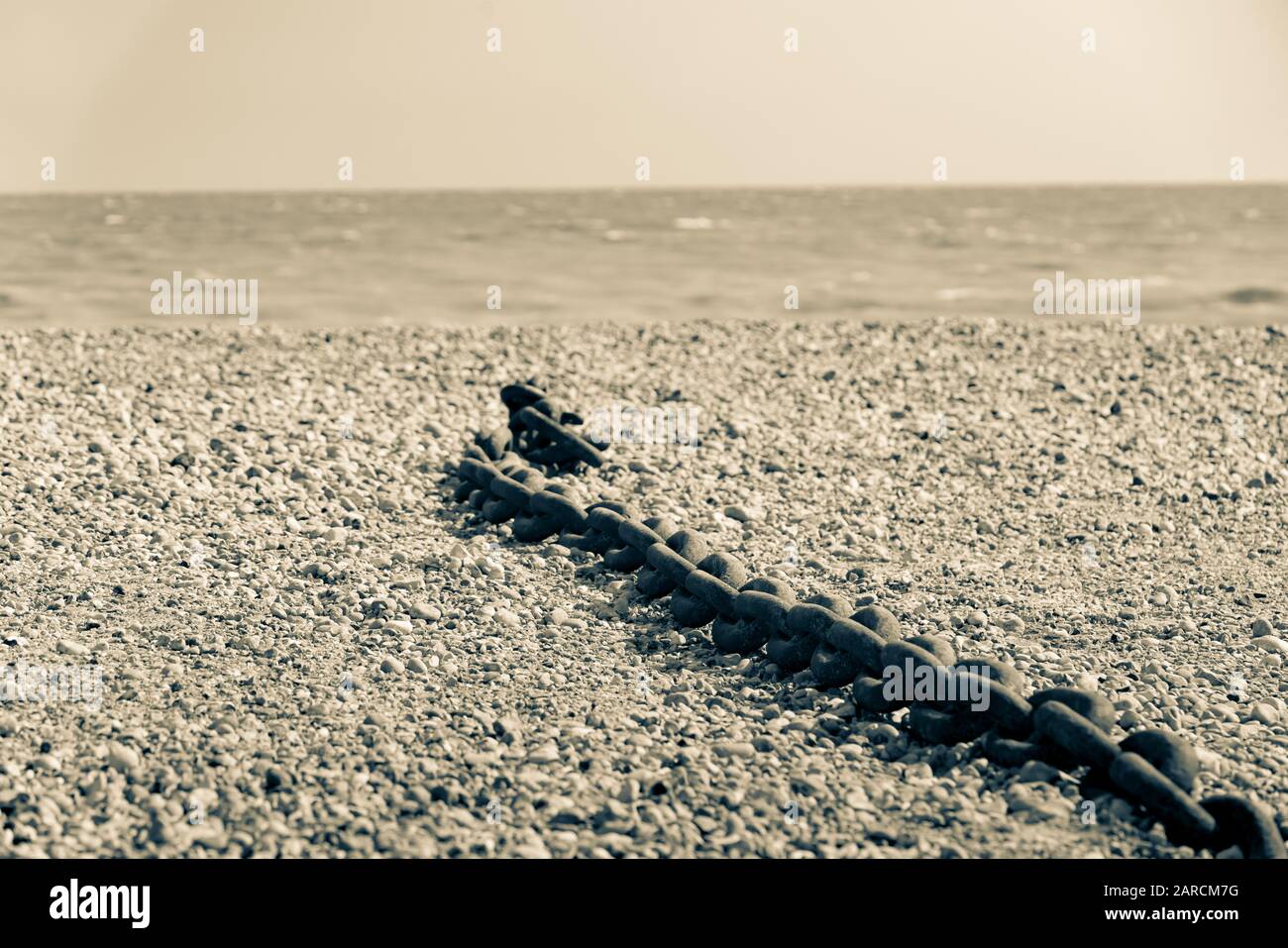 Rye Harbour Nature Reserve length old rusty heavy chain left lying on ...