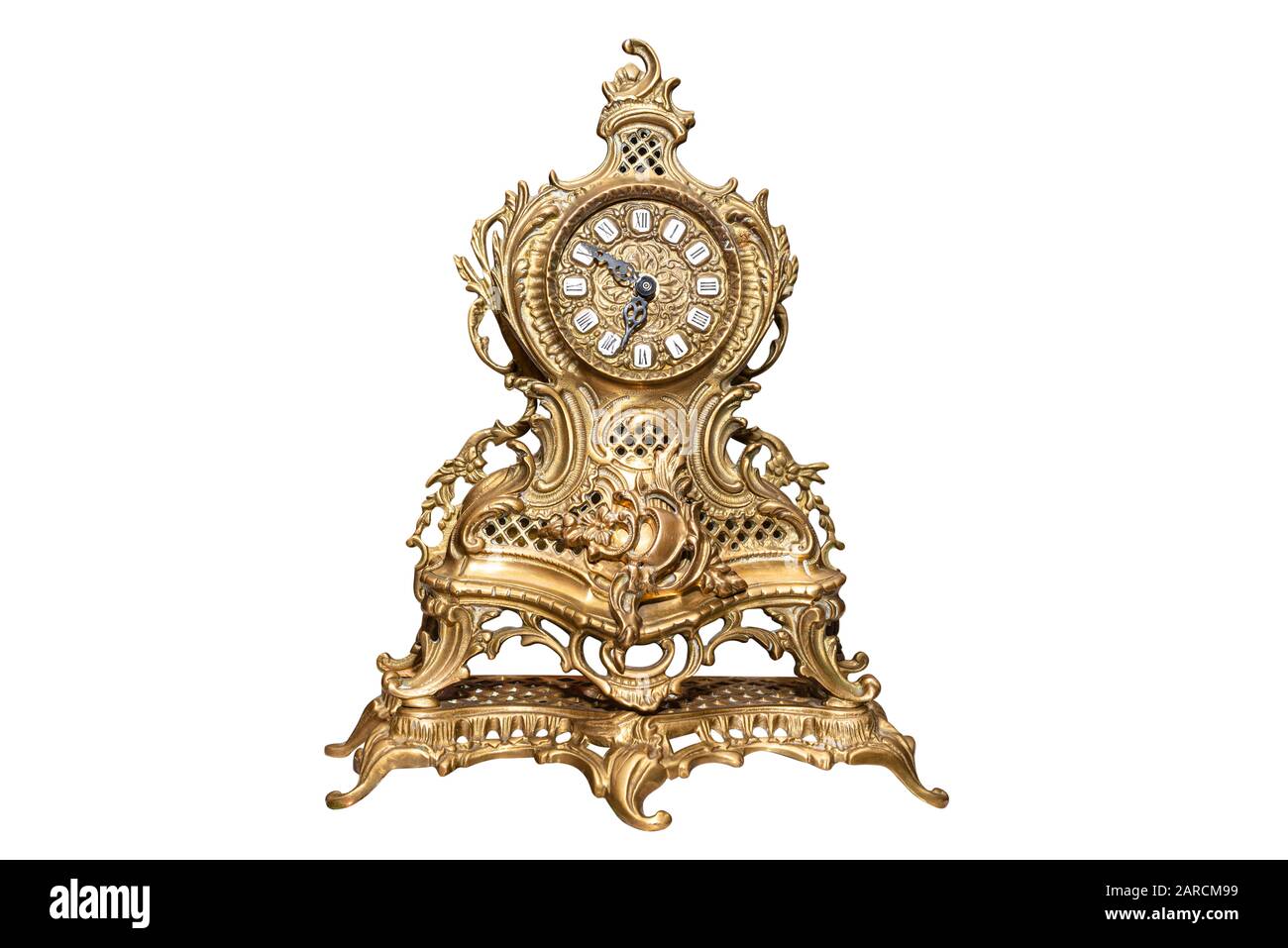 A large, standing clock made of brass with ornaments, isolated on a ...