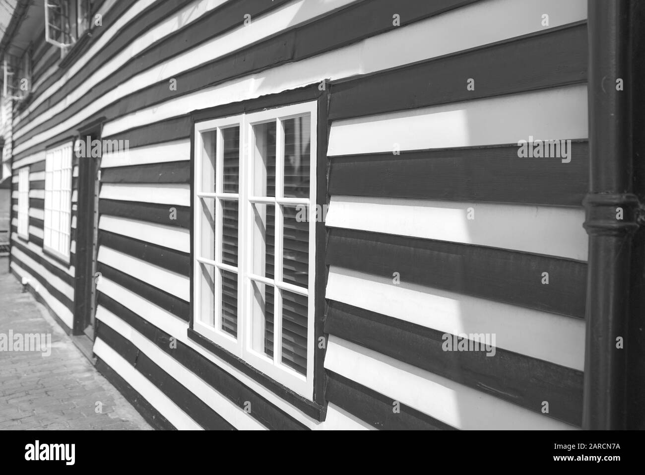 Black and white striped building, house with a difference, on street ...