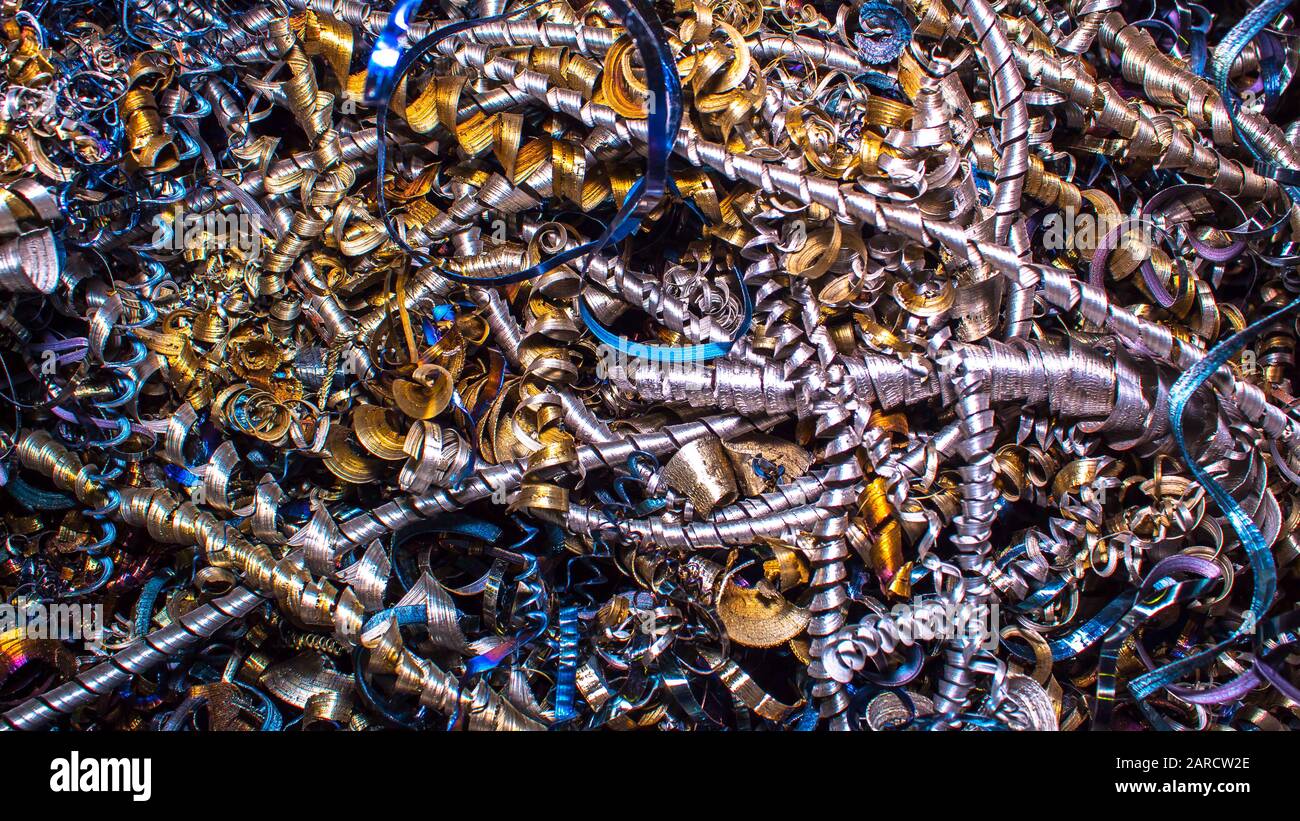 Abstract color background of metal shavings. Processing of ferrous and ...