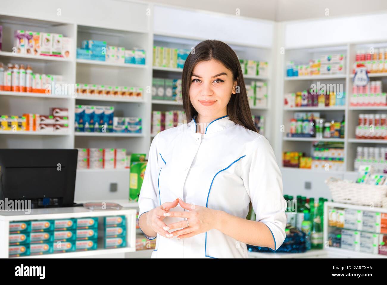 attractive woman pharmacist use hand gesture and looks smart and ...