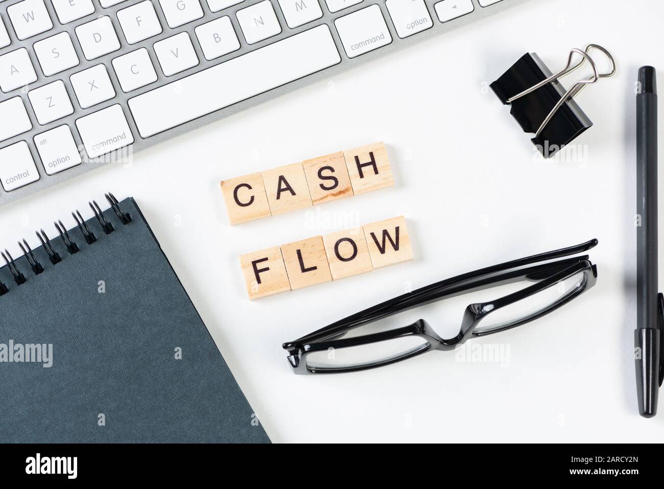 Cash flow statement concept with letters on cubes Stock Photo - Alamy