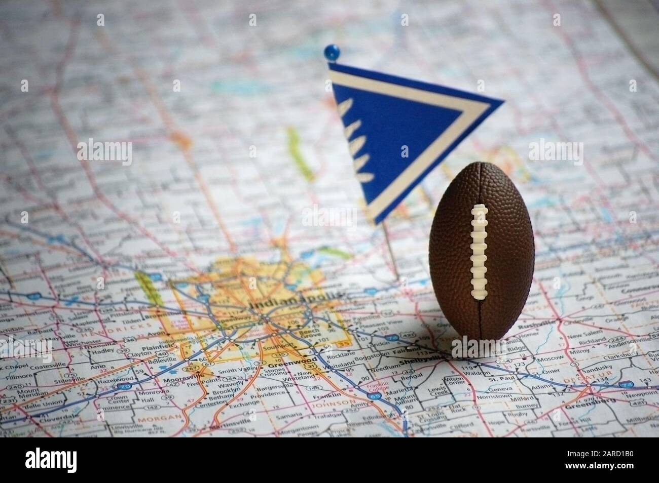 Close-up shot of a miniature football and flag placed on Indianapolis ...