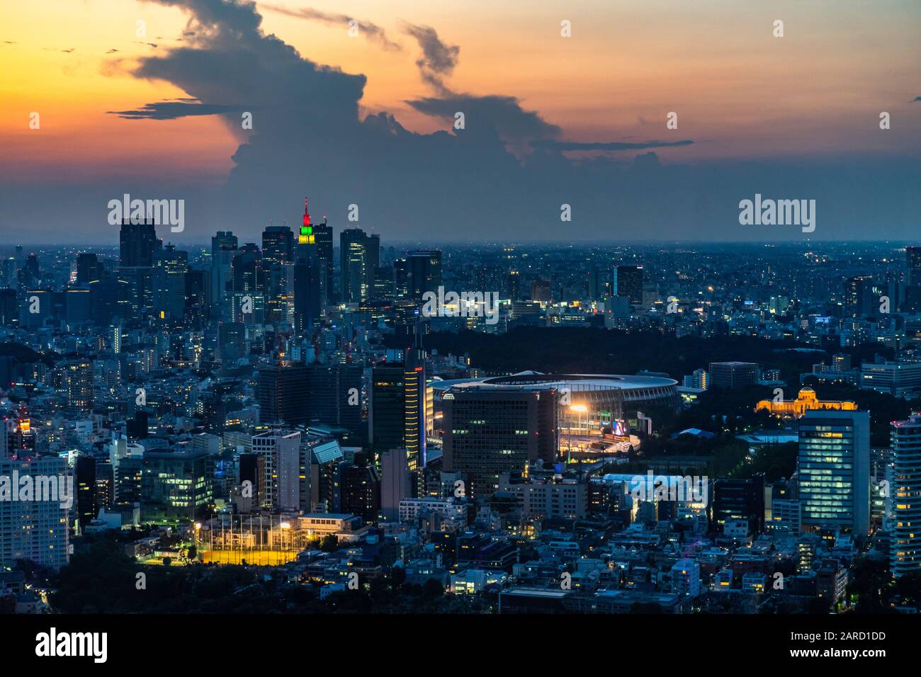 Tokyo skyline and skyscrapers at sunset viewed from Mori Tower ...