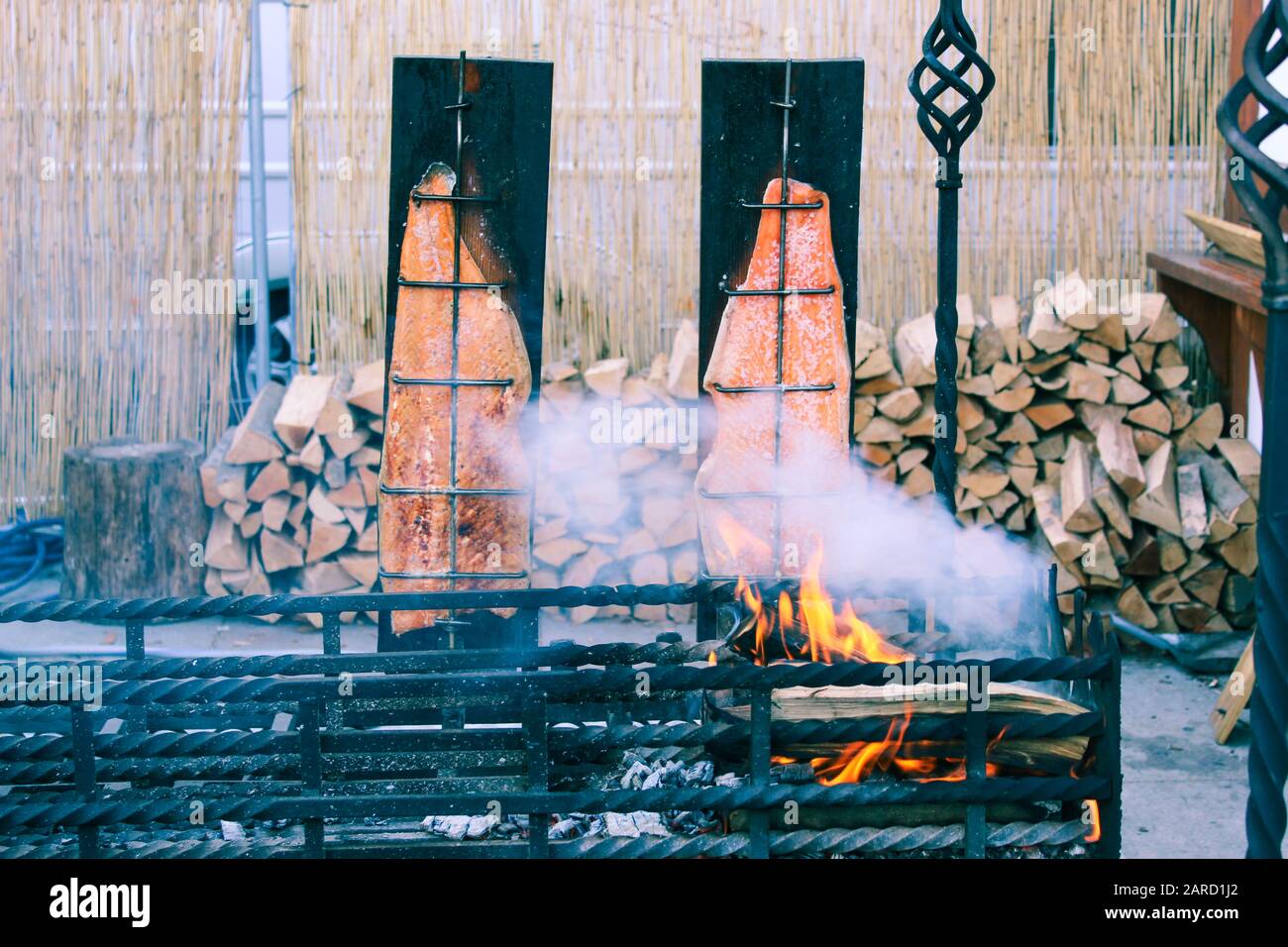 smoked salmon on skewers over fire Stock Photo - Alamy
