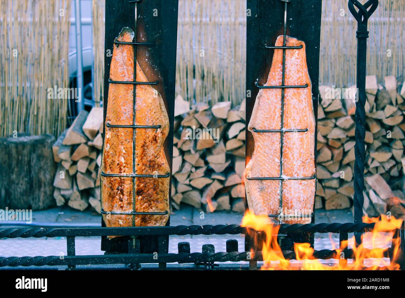 smoked salmon on skewers over fire Stock Photo - Alamy