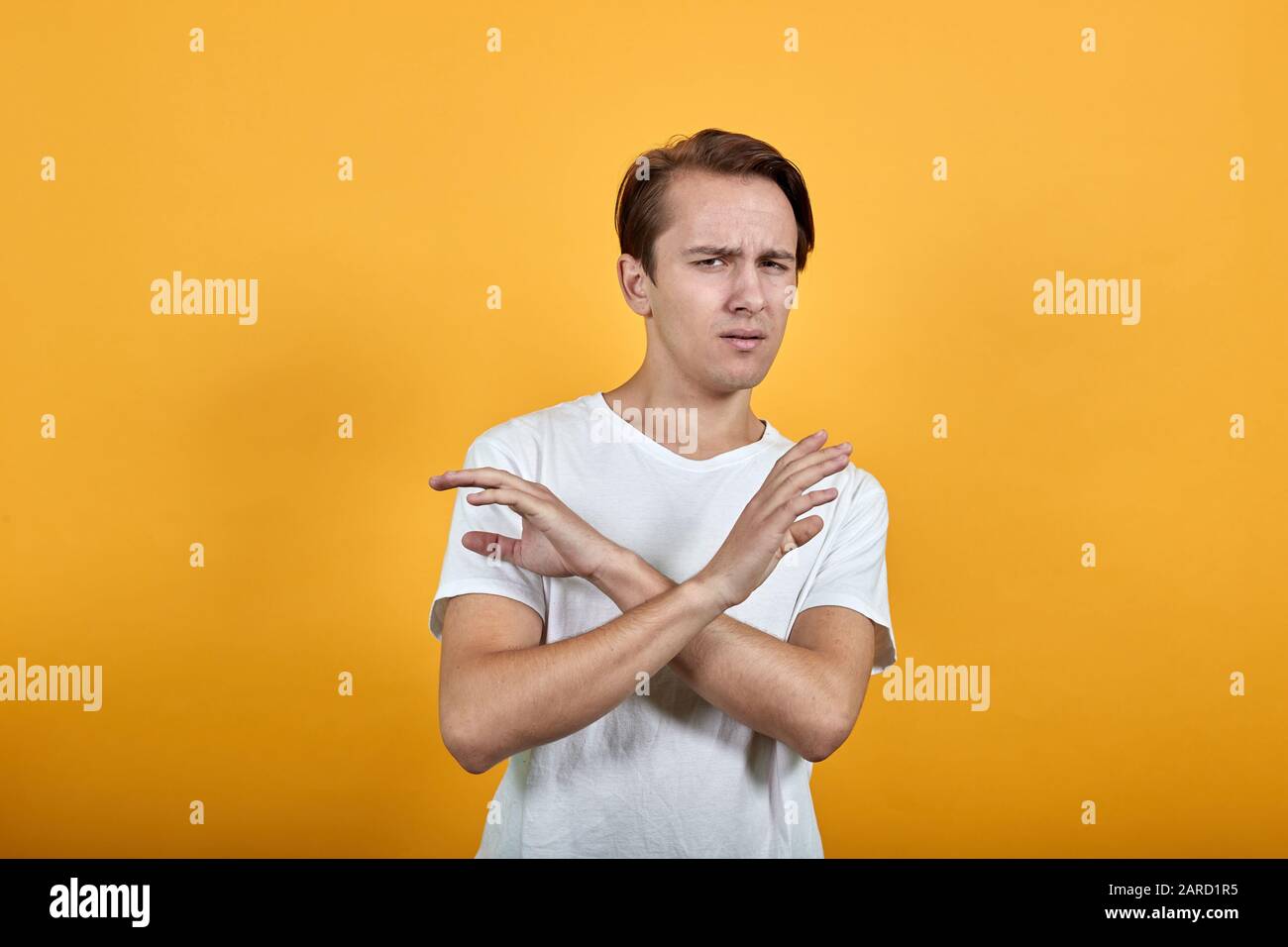 Man cross gesture no white angry hi-res stock photography and images ...