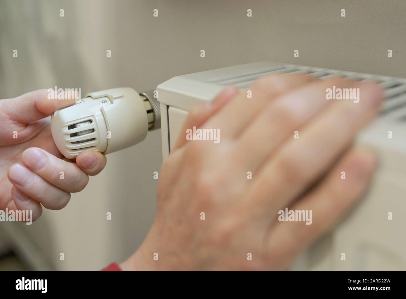 Adjusting thermostat hi-res stock photography and images - Alamy