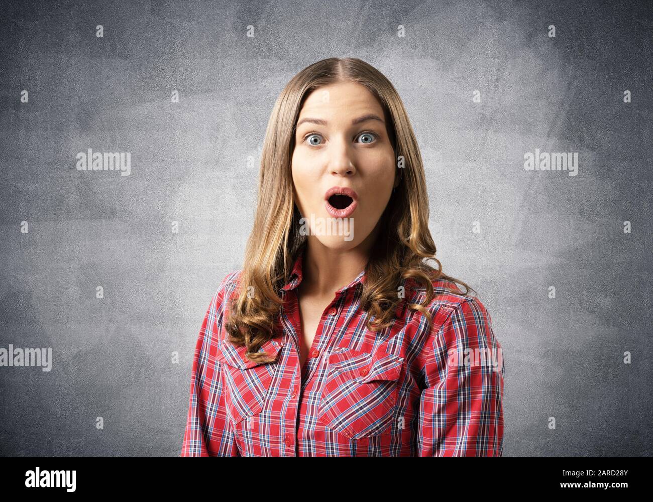 Stupefied pretty girl with mouth opened Stock Photo - Alamy