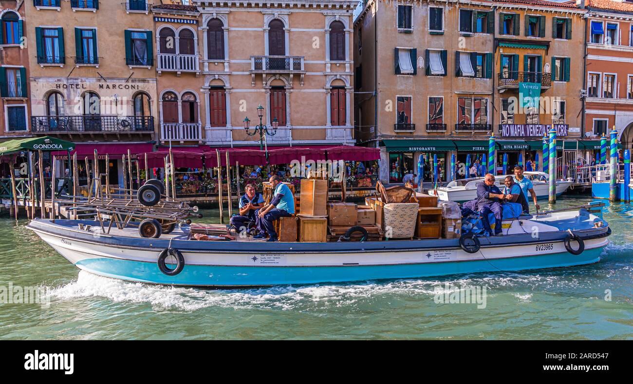 Moving Boat in Venice Stock Photo - Alamy
