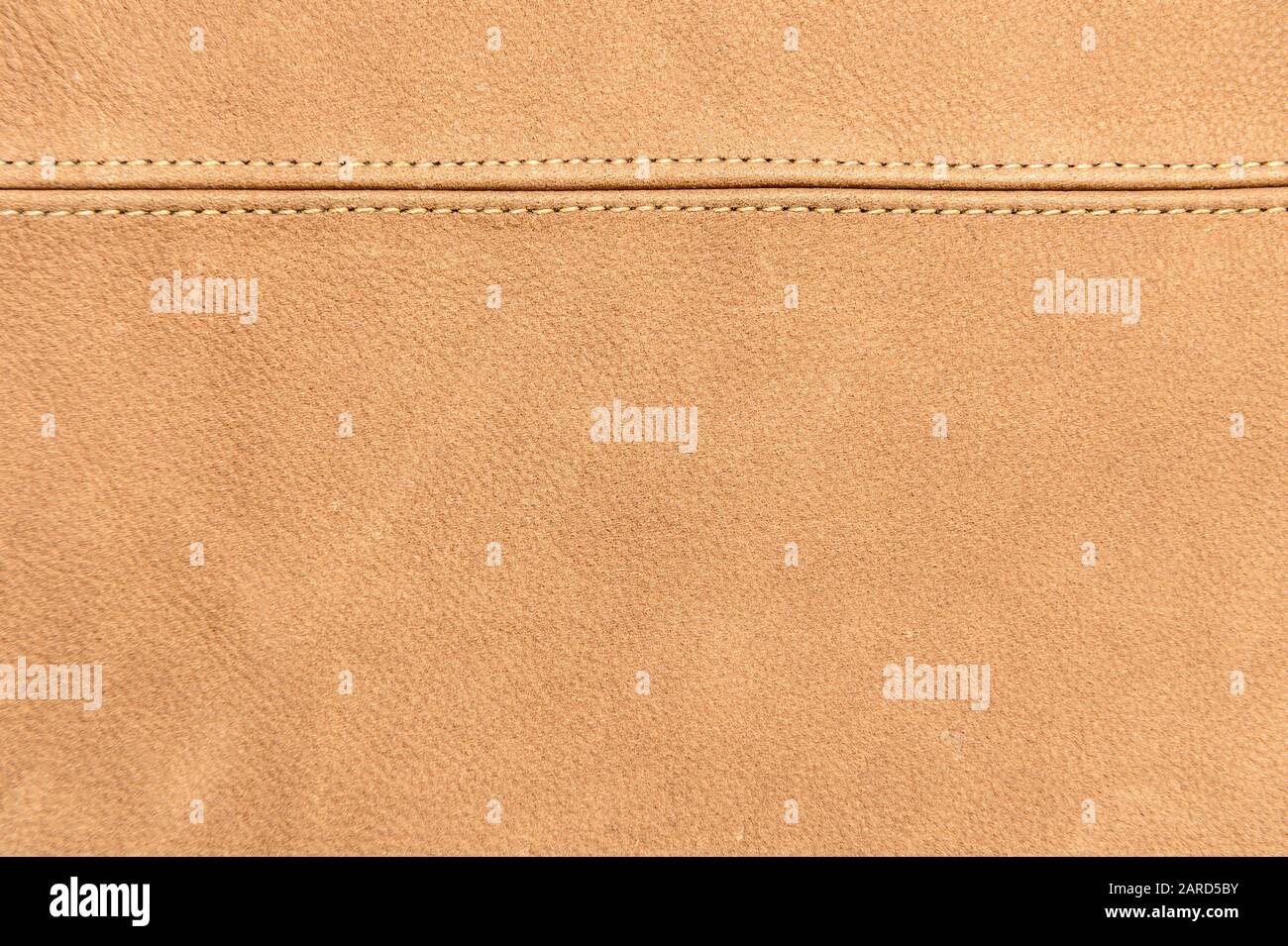 brown leather material background with sewing stitches, close up Stock ...
