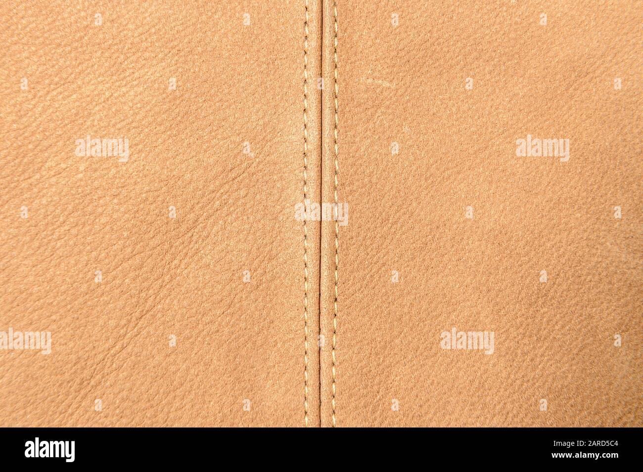 brown leather material background with sewing stitches, close up Stock ...
