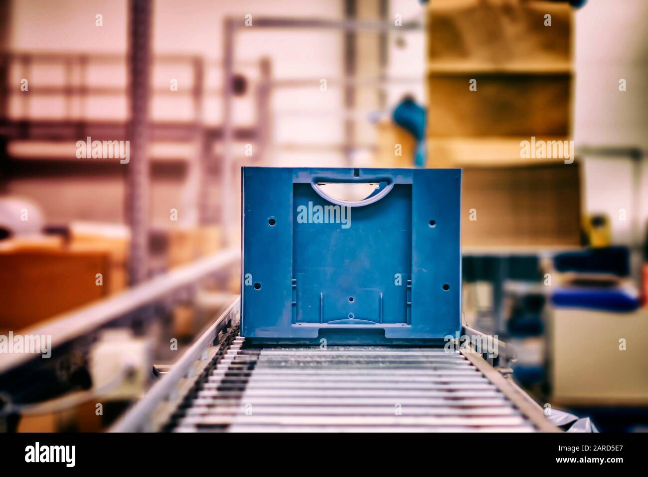 Blue boxes in a large, fully automated logistics warehouse run on a ...