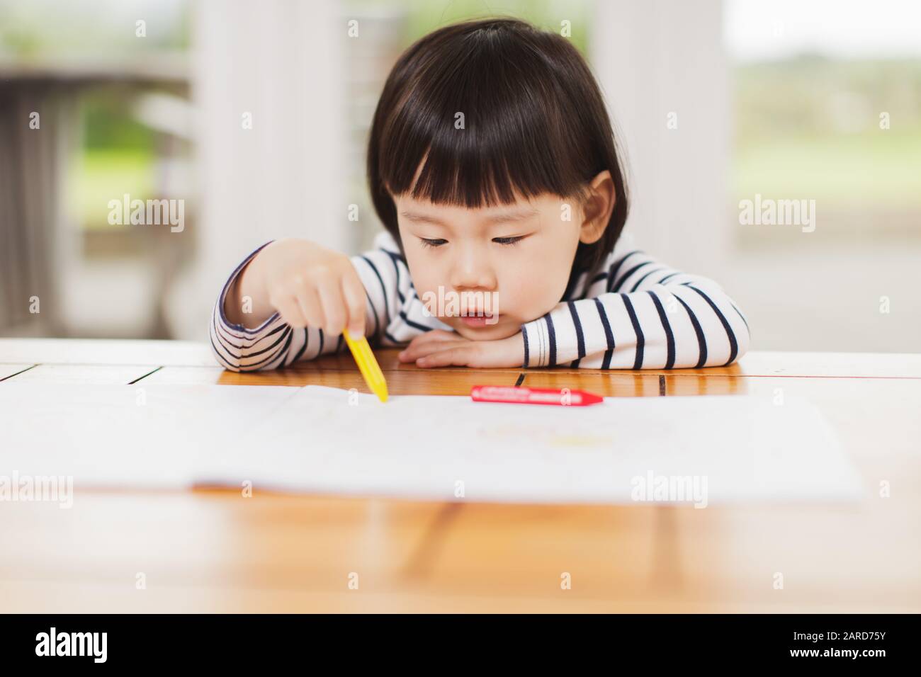 toddler girl learn drawing at home against white background Stock Photo ...