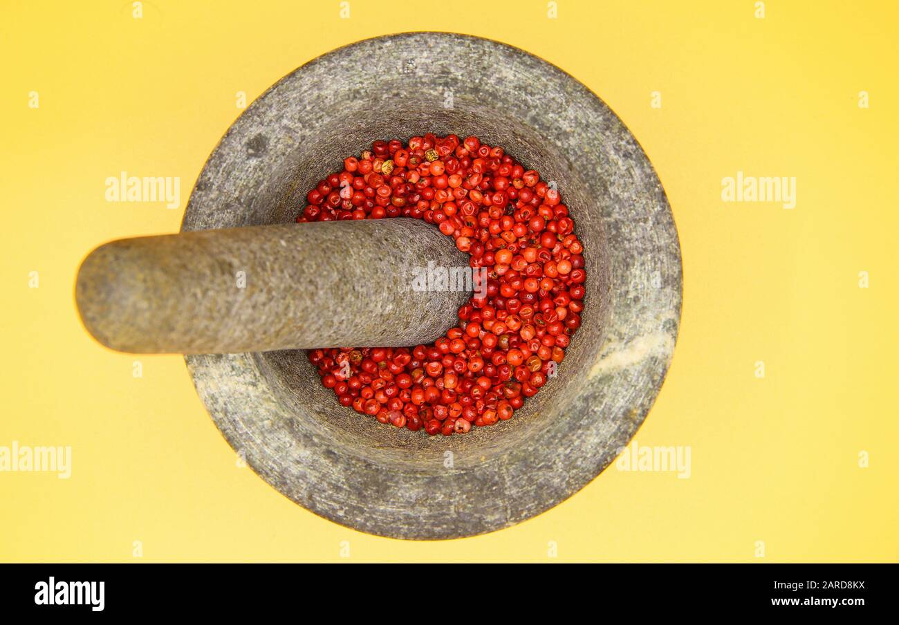 Top view close up on isolated gray basalt stone mortar with pestle and ...