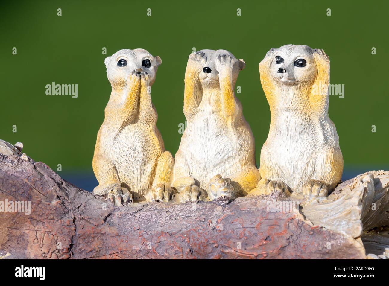 Close up of an ornament of three meerkats depicting the proverb hear no ...
