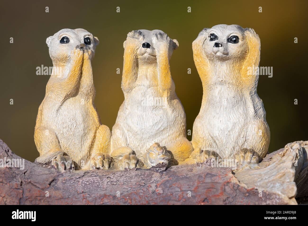 Close up of an ornament of three meerkats depicting the proverb hear no ...