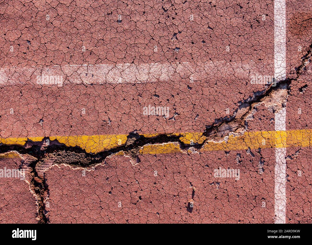 Crack on basketball court. Earthquake Stock Photo - Alamy