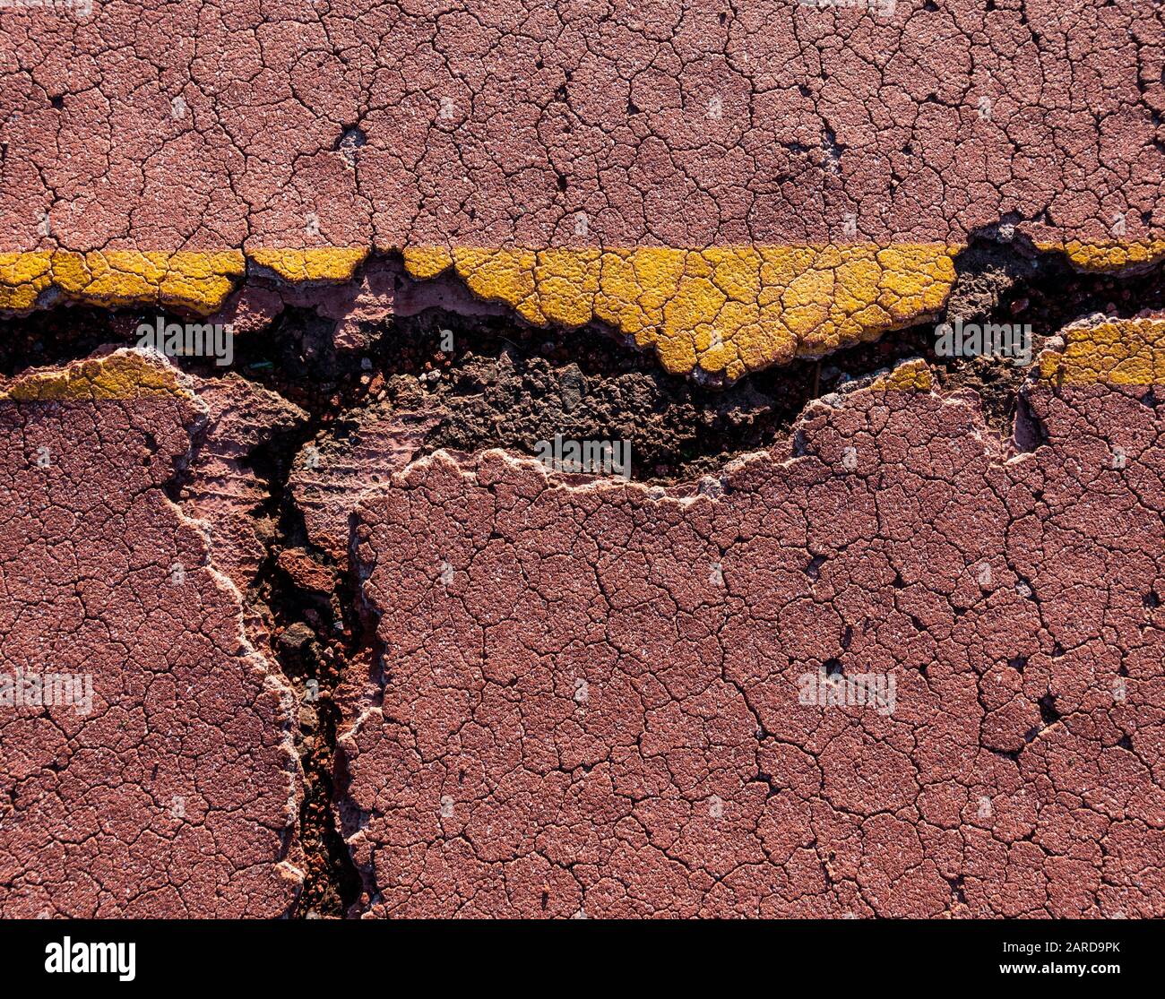 Crack on basketball court. Earthquake Stock Photo - Alamy