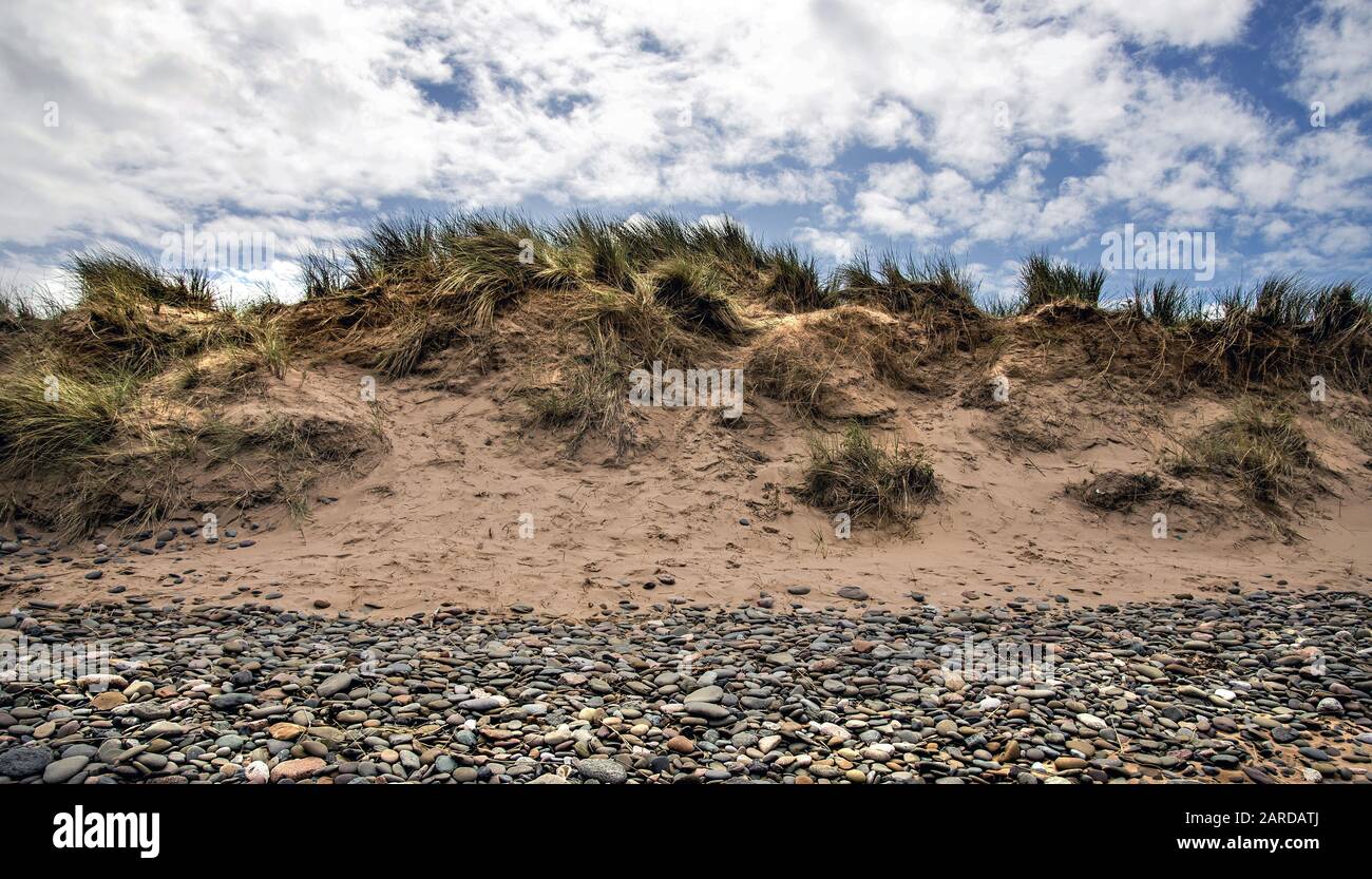 Clouds, dunes and pebbles, Sandscale Haws, Cumbria, England Stock Photo ...