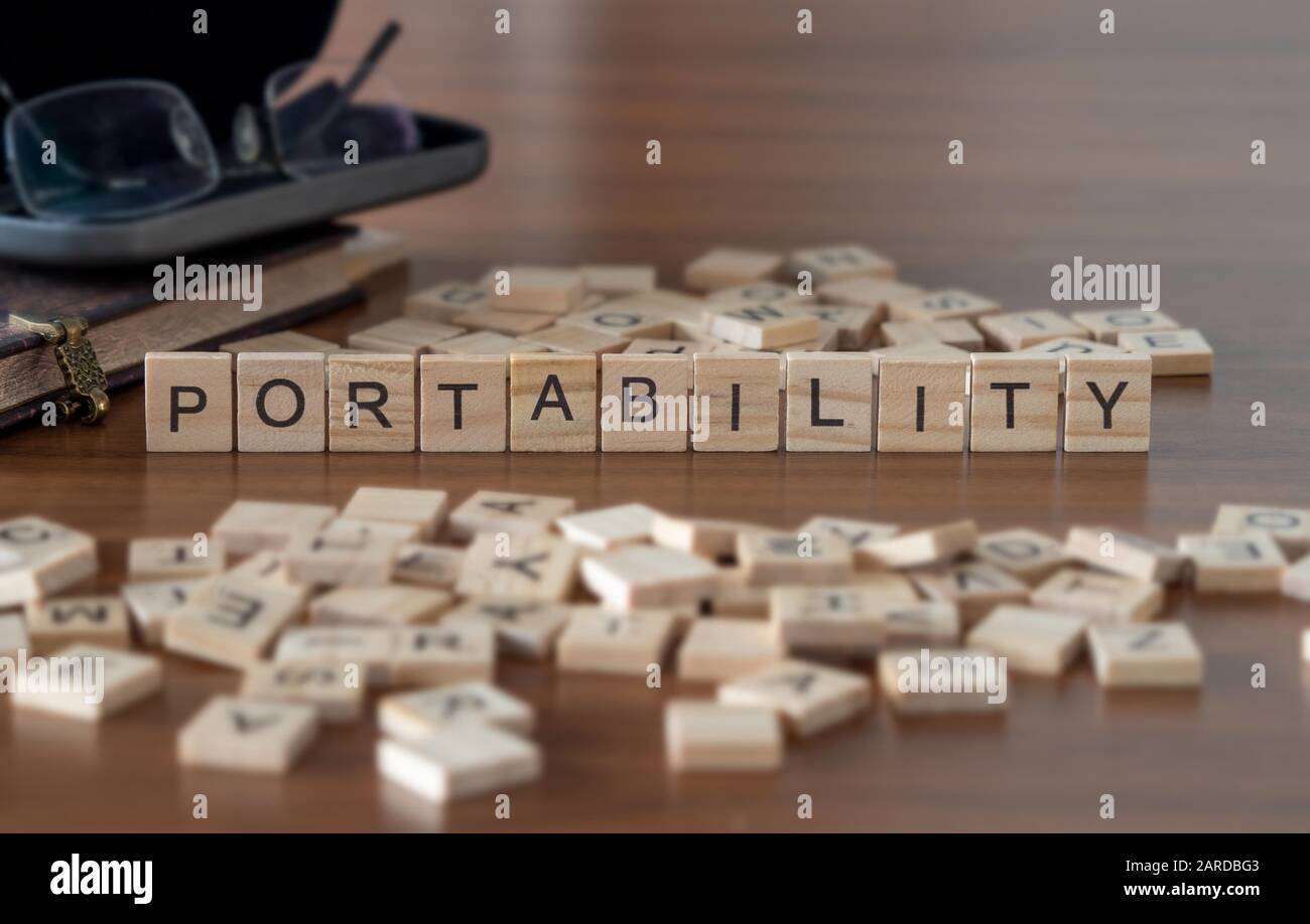 portability concept represented by wooden letter tiles Stock Photo - Alamy