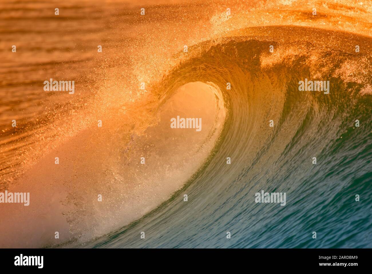 Beautiful big ocean wave with sunset color Stock Photo - Alamy
