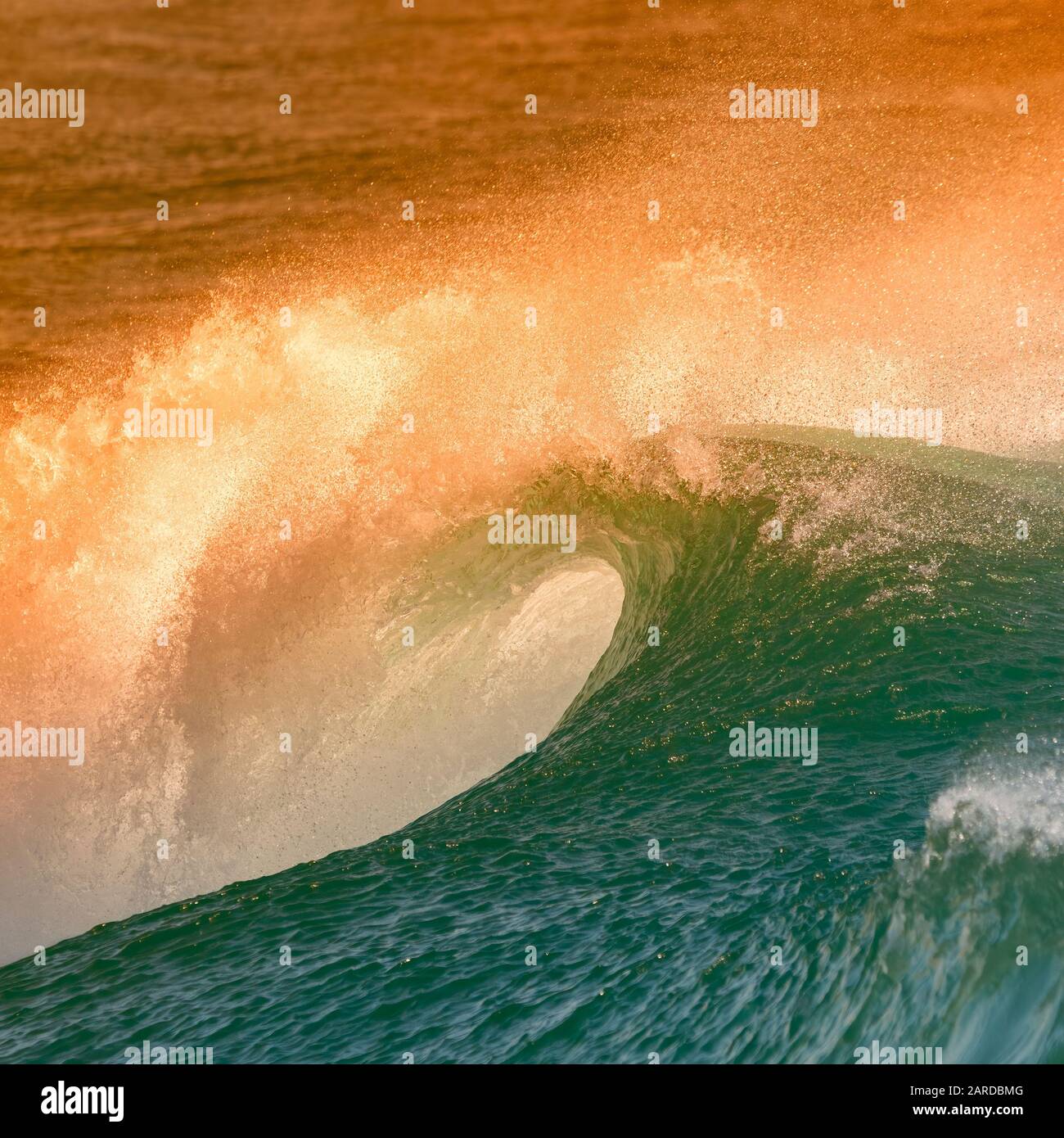 Beautiful big ocean wave with sunset color Stock Photo - Alamy
