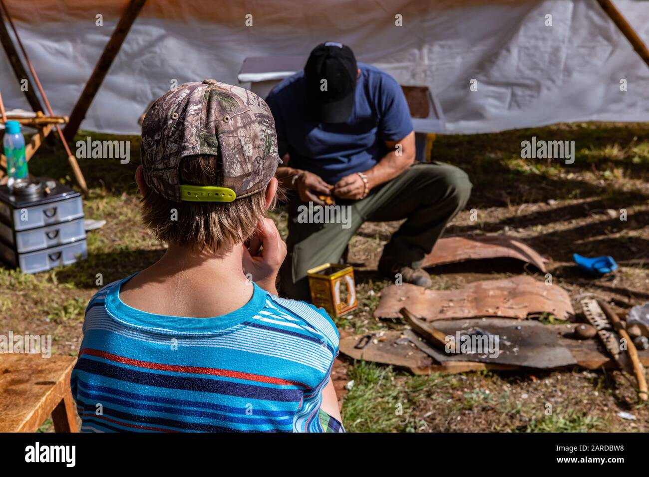 Boy sitting bench rear view hi-res stock photography and images - Alamy Boy sitting bench rear view hi-res stock photography and images - Alamy