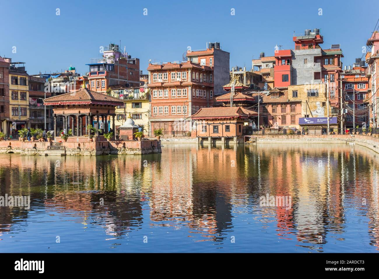 Pimbahal Pokhari Krishna Temple and houses in Patan, Nepal Stock Photo ...