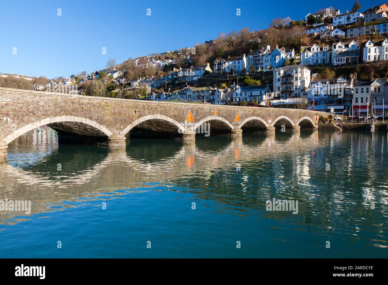 The historic bridge connecting East and West Looe Cornwall England UK ...