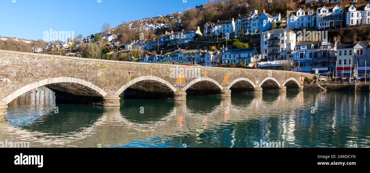 The historic bridge connecting East and West Looe Cornwall England UK ...