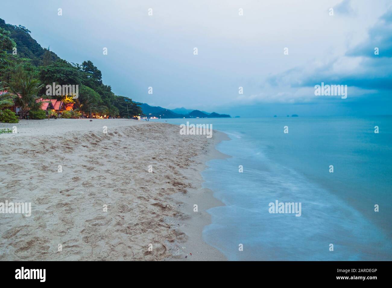 Tropical beach under gloomy sky hi-res stock photography and images - Alamy