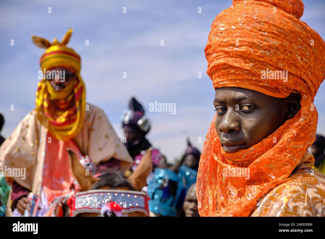 Portrait of a page wearing a colourful turban scorting his master ...