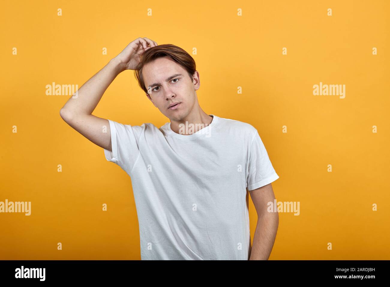Man scratching head back hi-res stock photography and images - Alamy