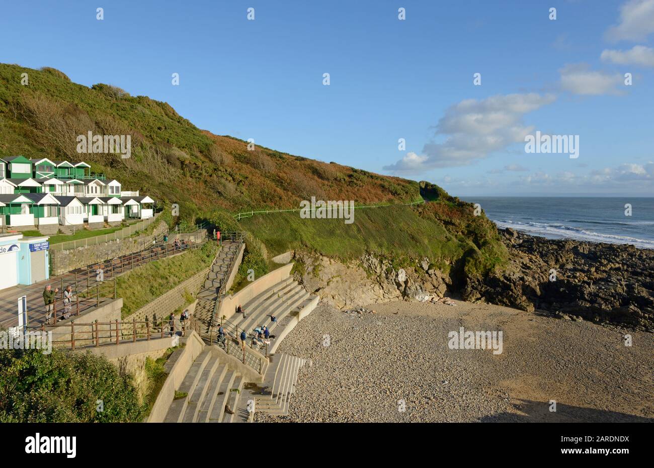 Many people at Rotherslade near Langland bay on the Gower peninsula ...