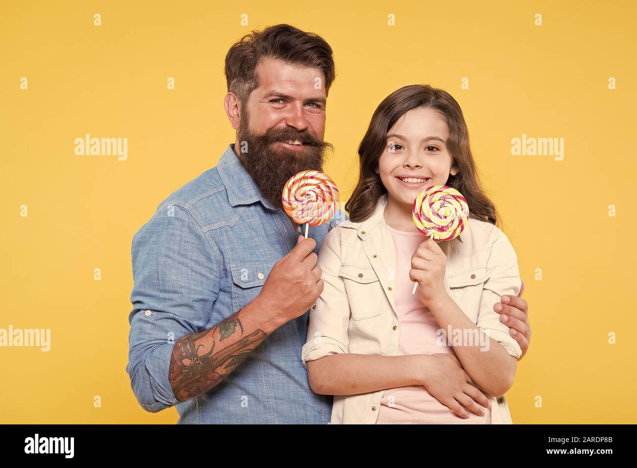 Sweet dessert. Bearded hipster good daddy for adorable daughter. Sweets ...