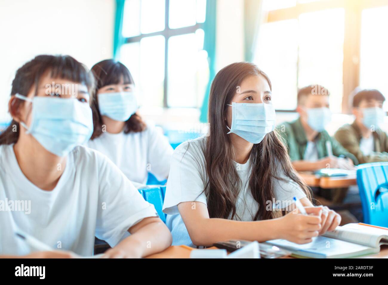 Students wearing protection mask to prevent germ, virus and PM 2.5 ...