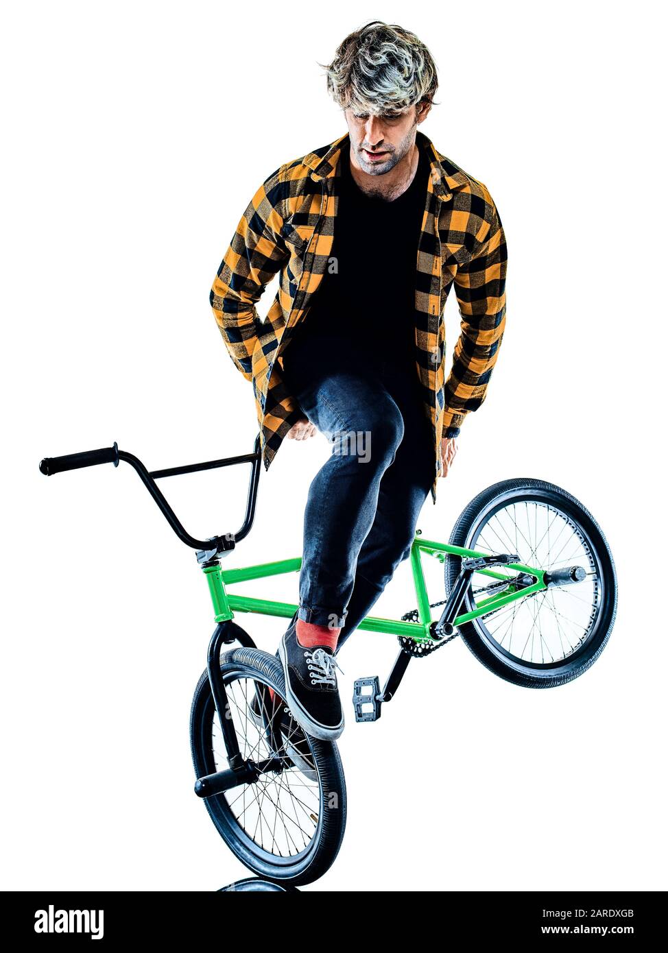 one young caucasian man BMX rider cyclist cycling freestyle acrobatic ...