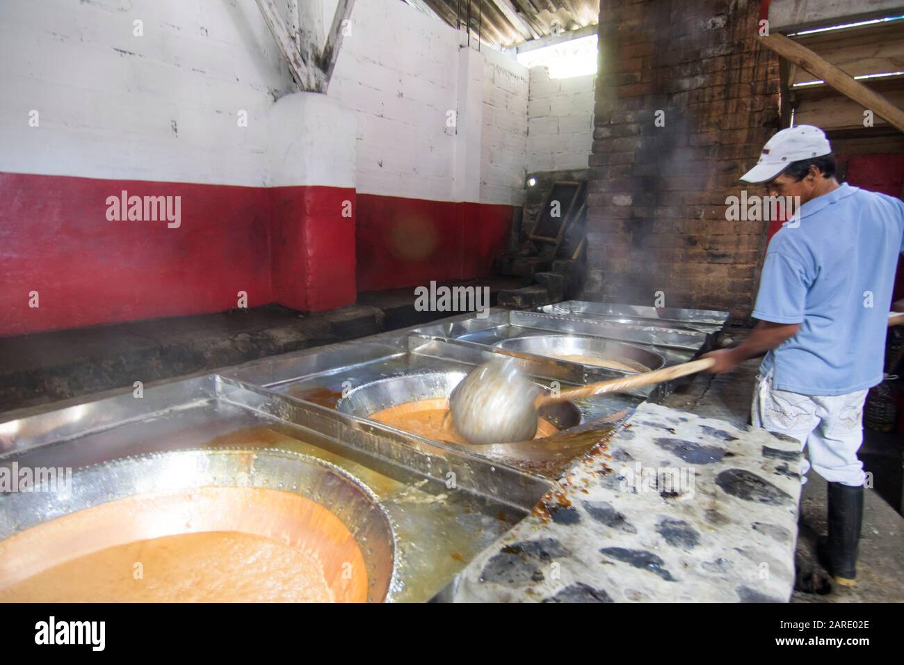 Boiling the sugar cane juice hi-res stock photography and images - Alamy