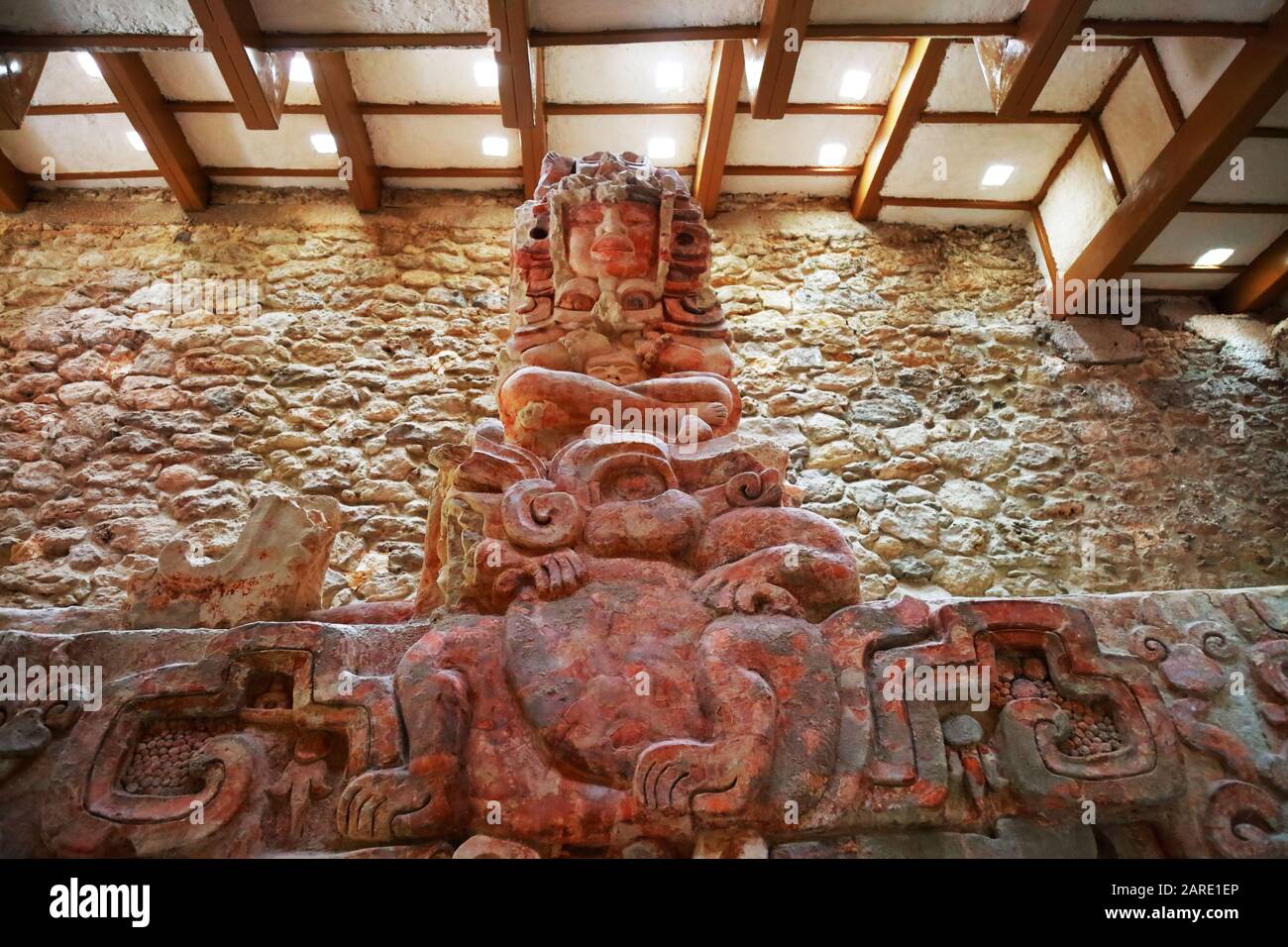 A full-sized colorful stucco frieze similar in sructure to the wooden ...
