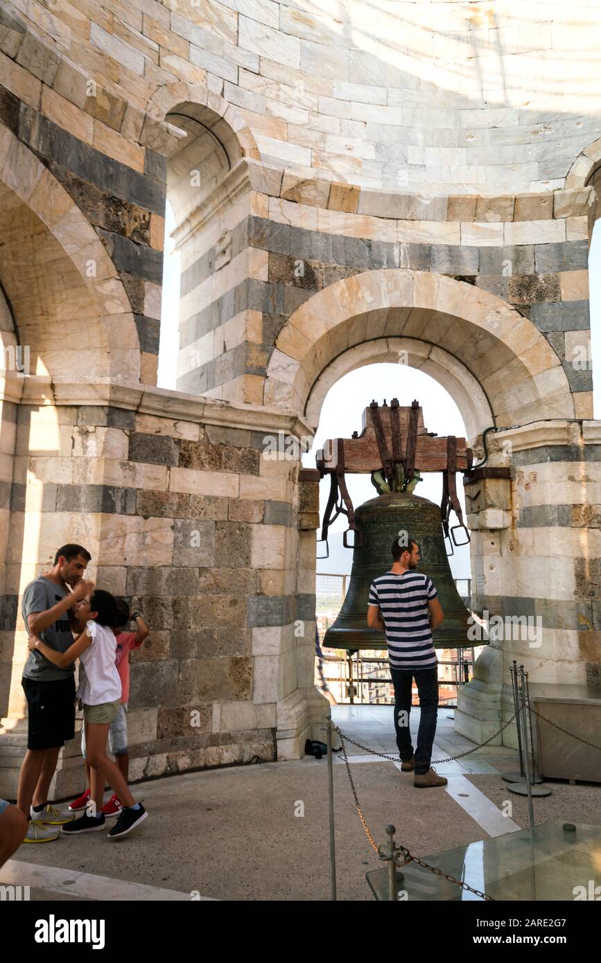 Tourists visiting the bell tower on top of the Leaning Tower of Pisa ...