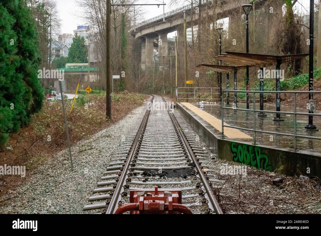 Old unused train tracks and station just before the entry to Granville ...