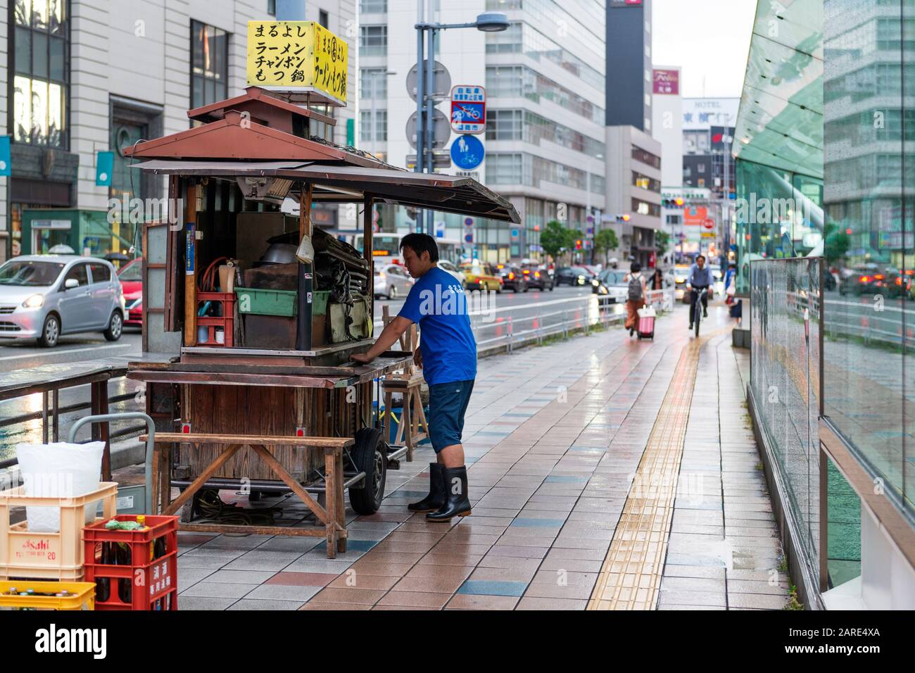 FUKUOKA, JAPAN, 27 MAY 2019: street food seller preparing his food ...