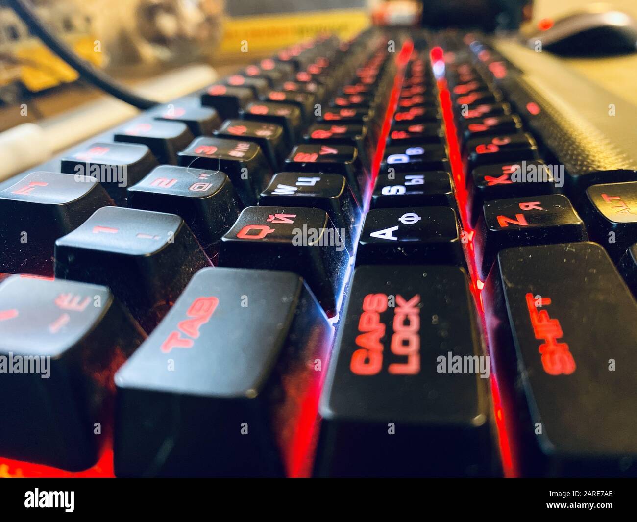 Low angle shot of a keyboard with red and white lights Stock Photo - Alamy