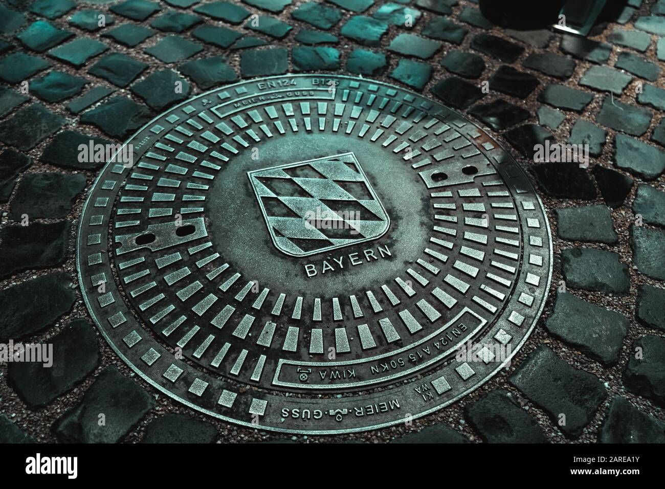 MUNICH, GERMANY - Jan 25, 2020: Picture of a manhole in traditional ...