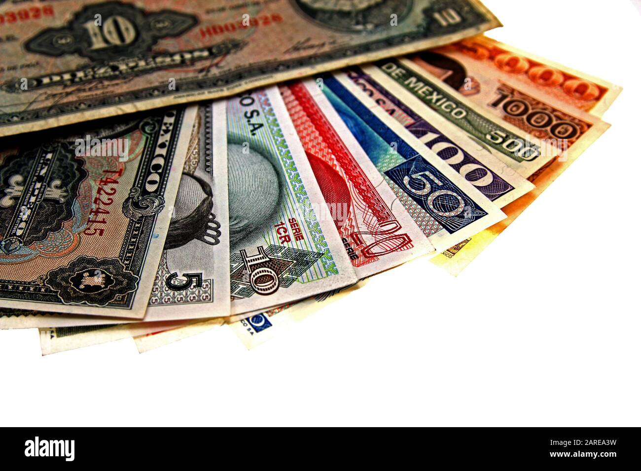 Overhead shot of paper bills laid in a white surface Stock Photo - Alamy