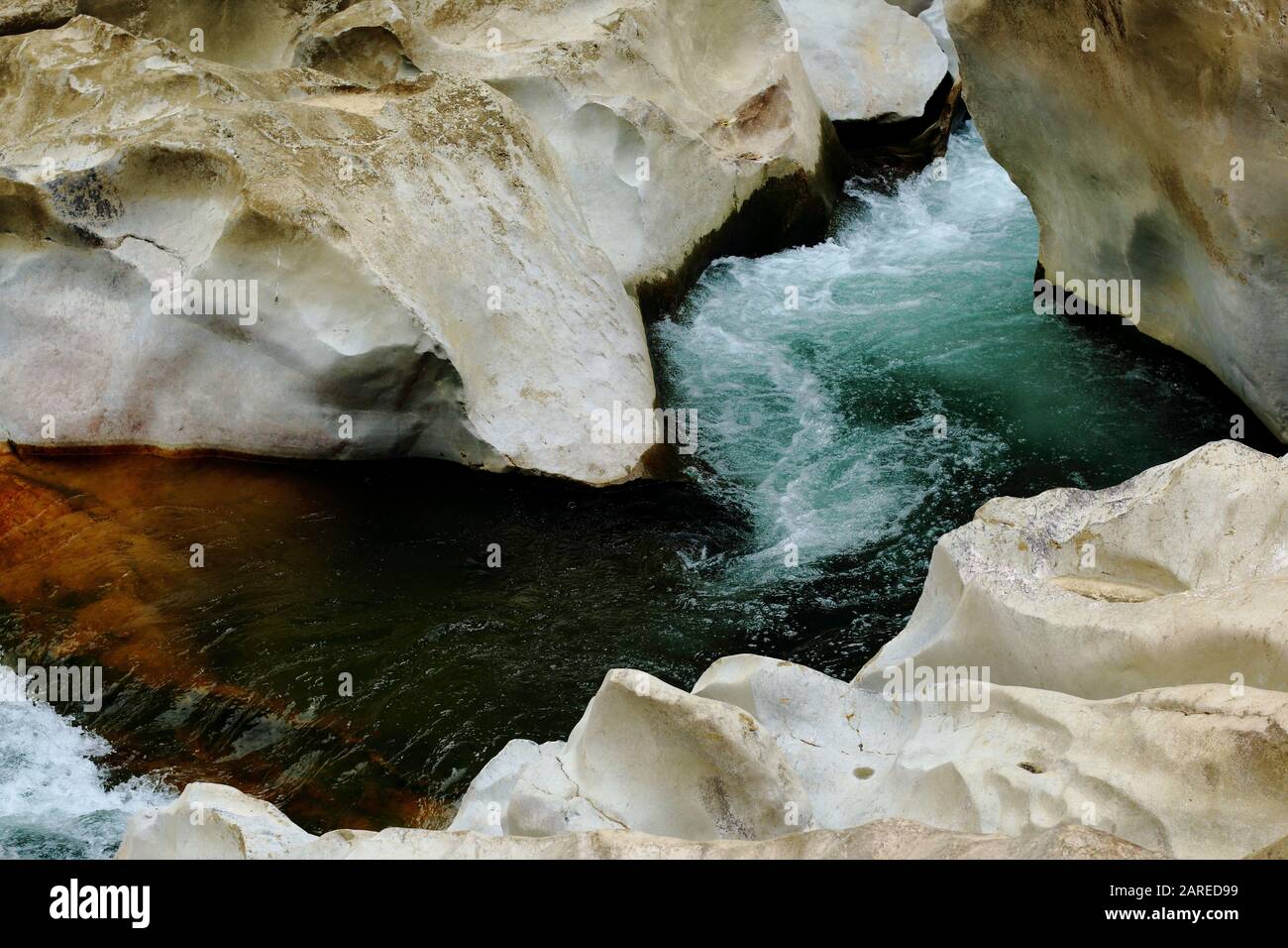 water flowing through amazing river rocks,conceptual nature background ...