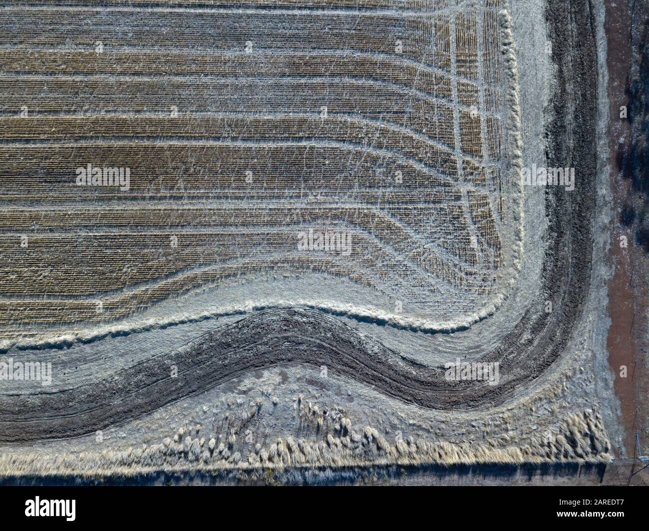 Farmland landscape aerial view with fence line and background patterns ...